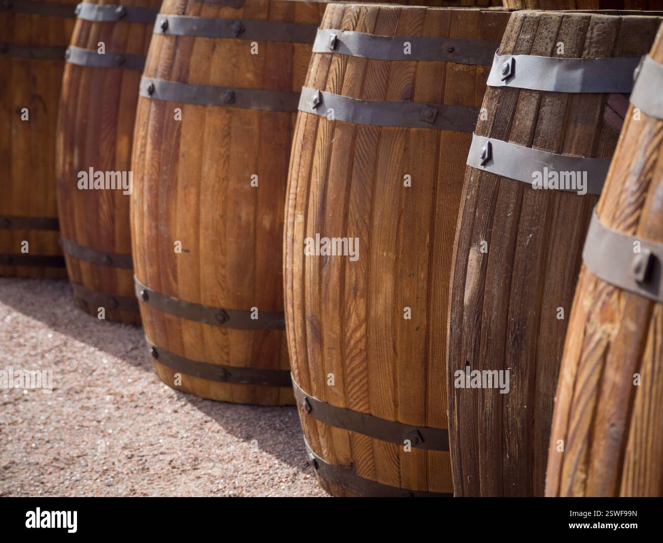 Wooden barrels with herring stand in a row in the port Stock Photo - Alamy