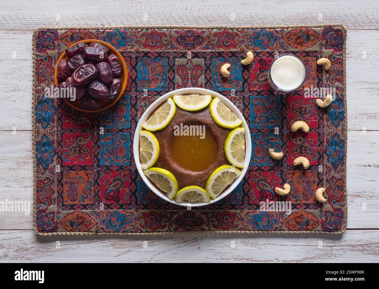 Saudi Arabia traditional dish Hineni, it is a mixed of dates and whole ...