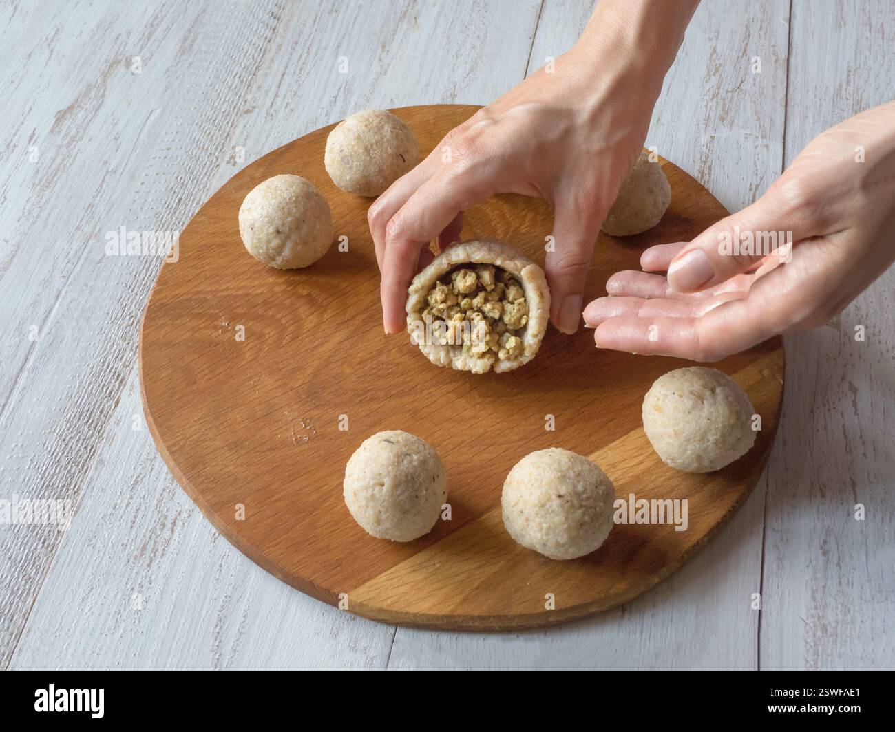 Raw Kibbeh. Cooking of Arabic meat appetizer Kibbeh. Traditional Arabic ...