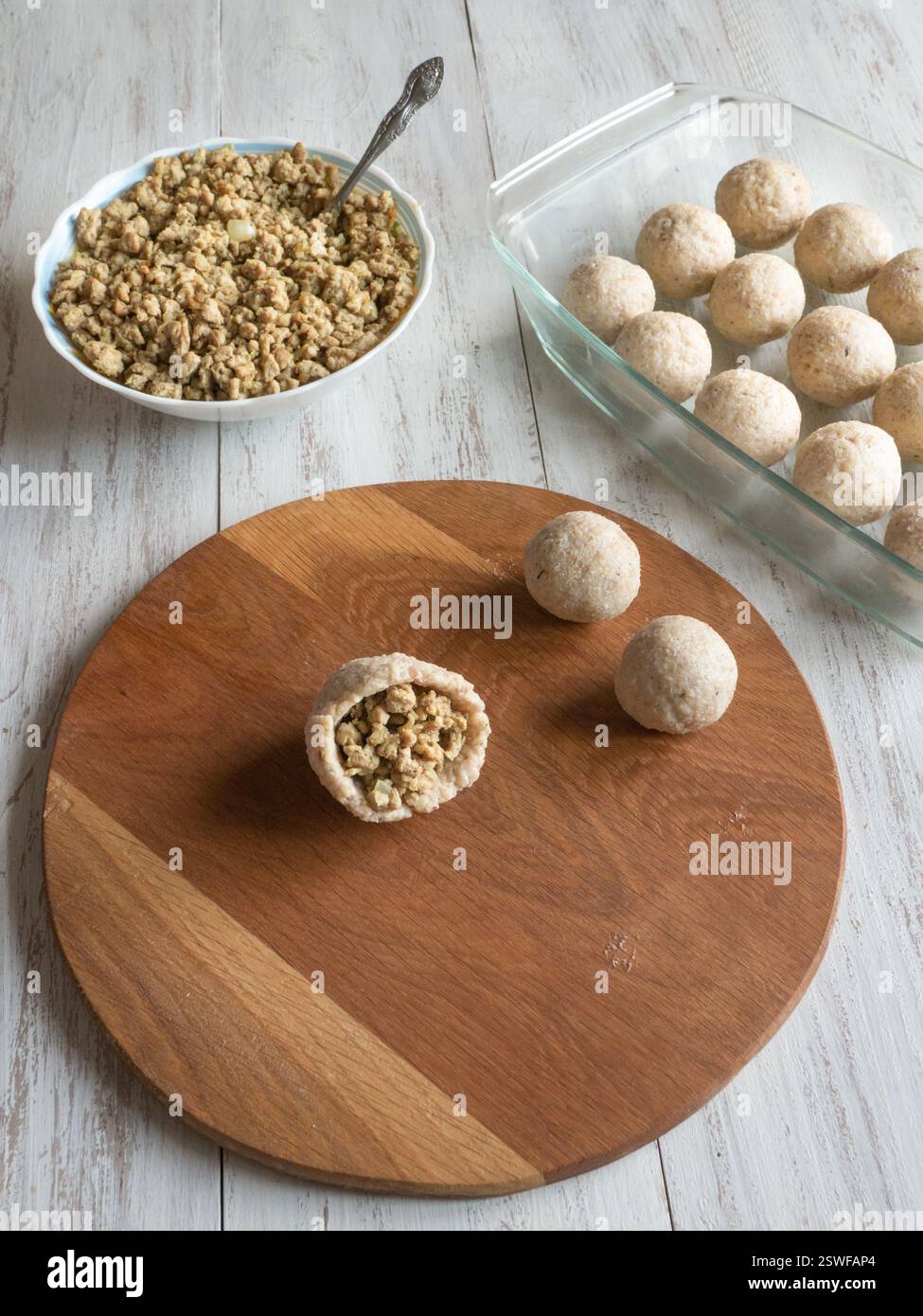 Cooking of Arabic meat appetizer Kibbeh. Traditional Arabic kibbeh with ...