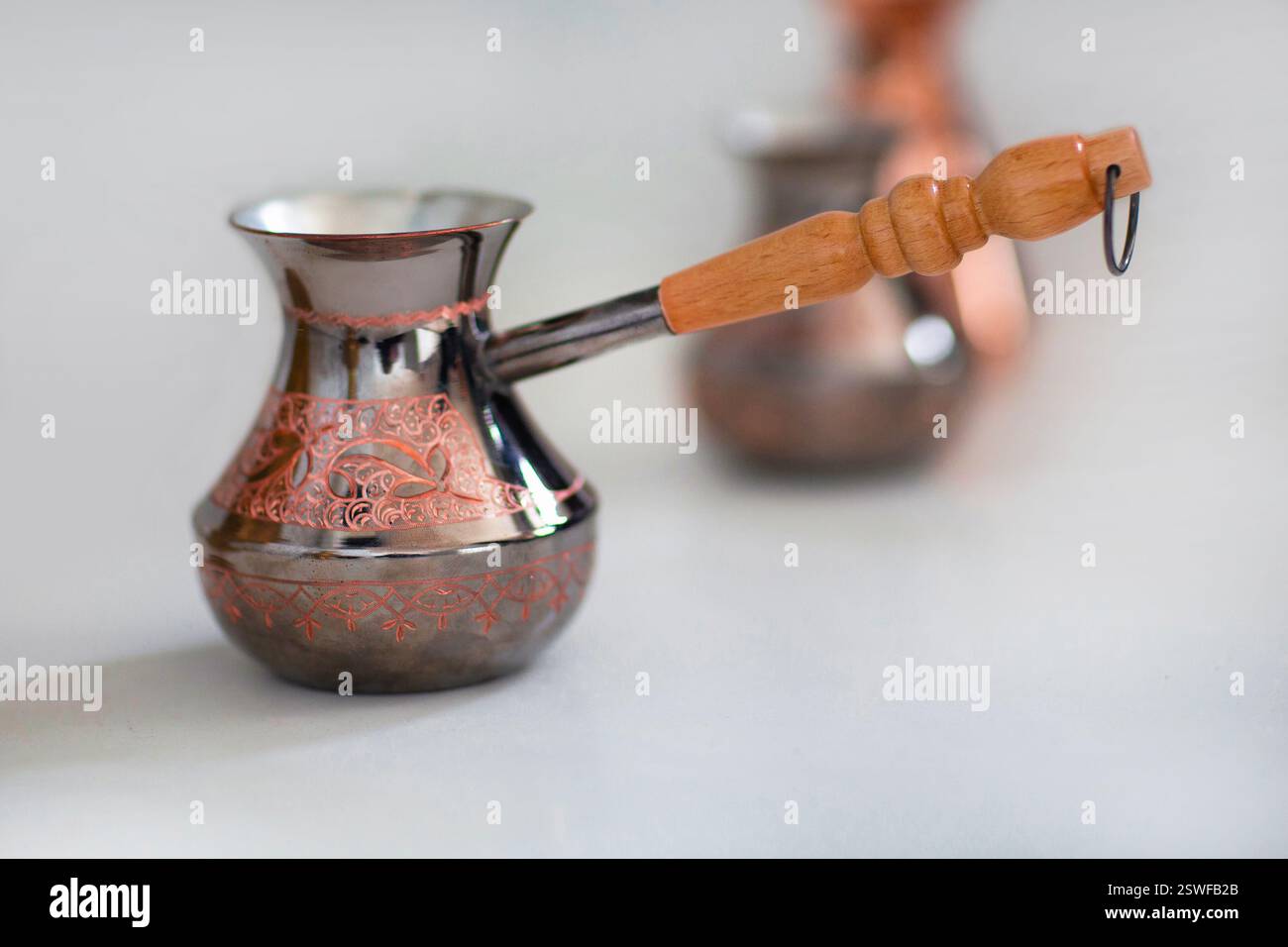Selective focus. Luxury Turkey coffee cezve view in close up. Beautiful ...