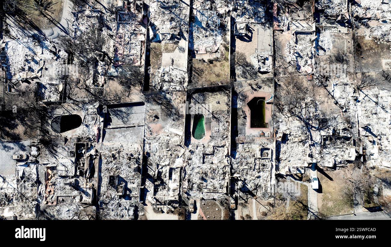 FILE - Residences destroyed by the Eaton Fire line a neighborhood in ...