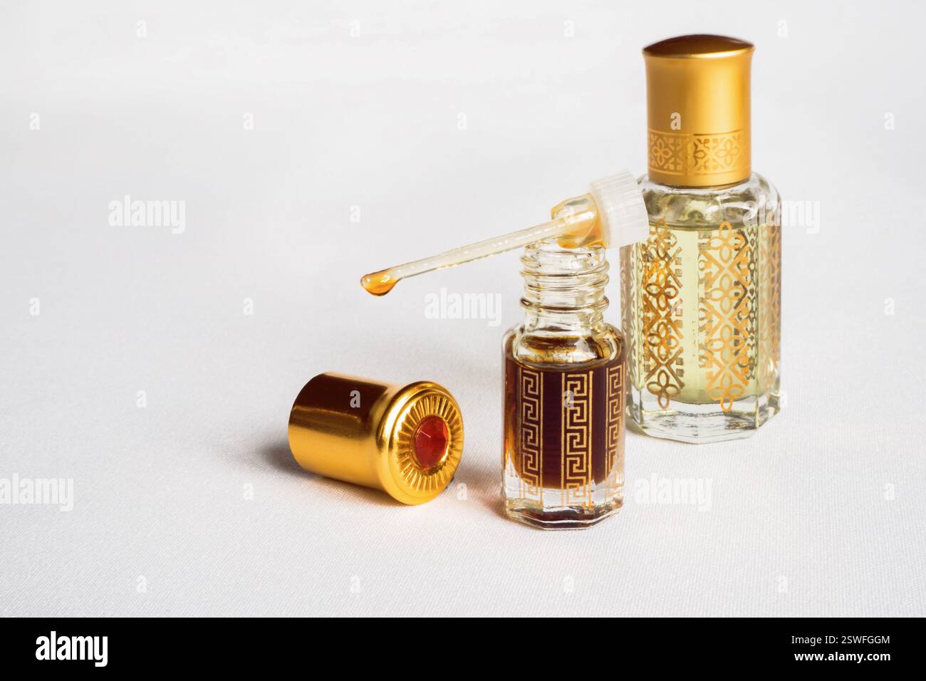 Arabian oud attar perfume in mini bottles Stock Photo - Alamy