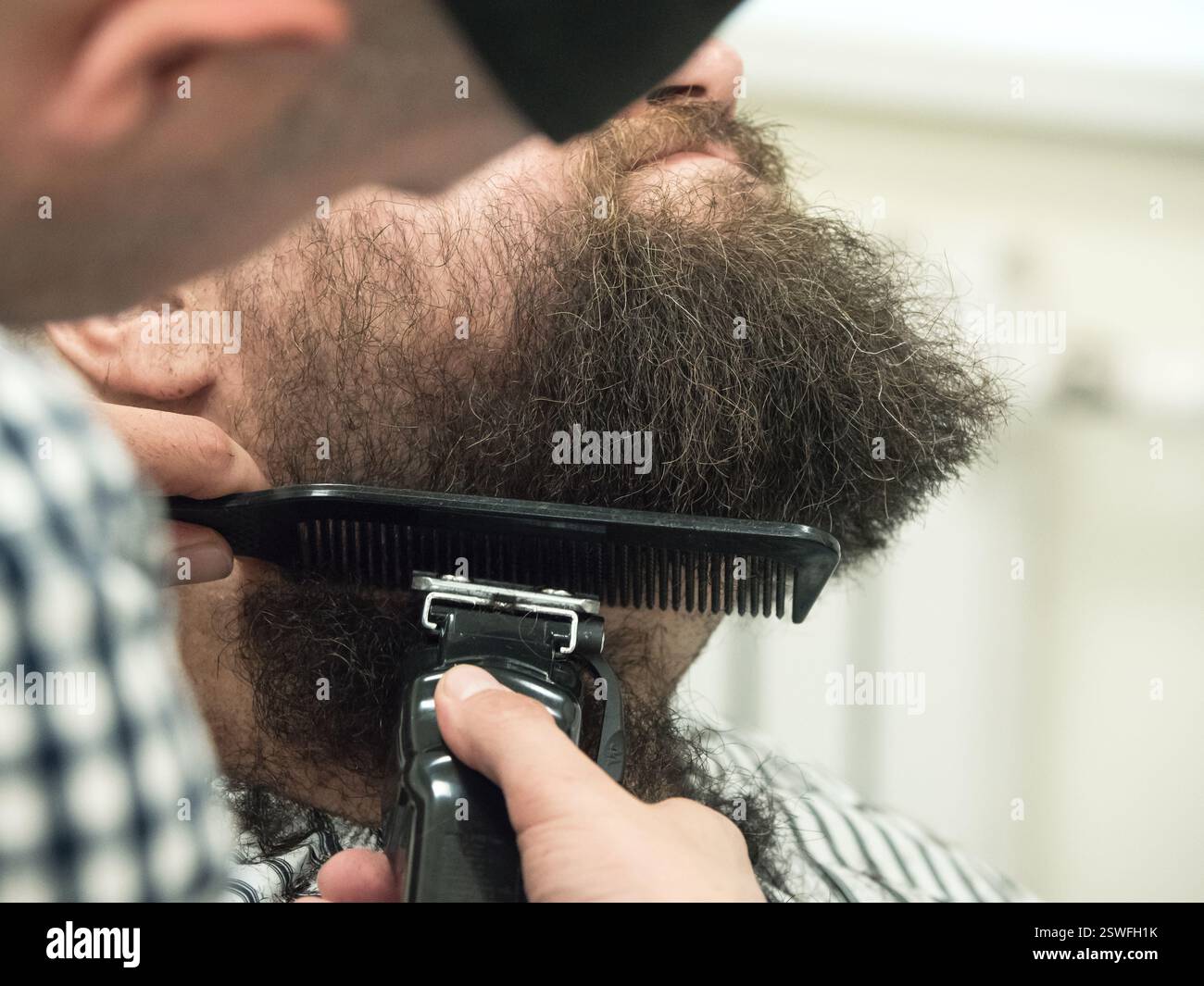 Close up barber in black hi-res stock photography and images - Alamy