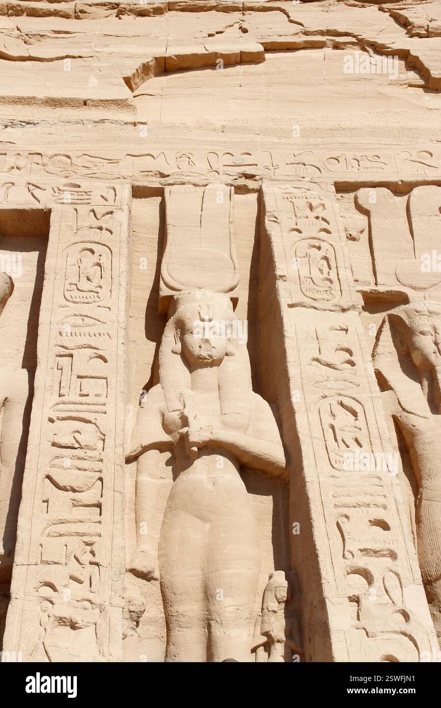 Colossal standing statue of Nefertari at entrance of the Temple of ...