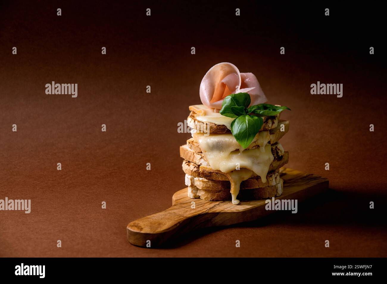 Stockpile of homemade toasted cheese pressed sandwiches Stock Photo - Alamy