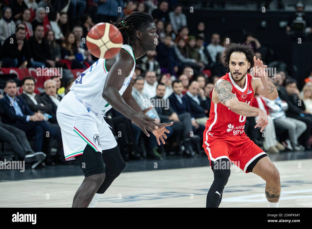 Istanbul, Turkey. 20th Feb, 2025. Shane Larkin (R) of Turkiye in action ...