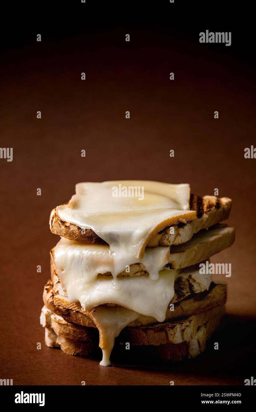 Stockpile of homemade toasted cheese pressed sandwiches Stock Photo - Alamy