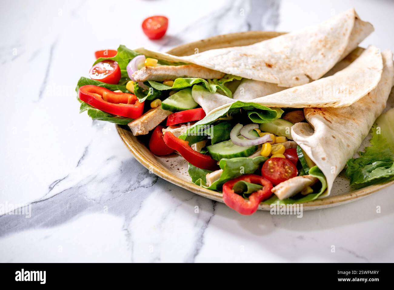 Traditional mexican tortila wrap with pork meat Stock Photo - Alamy