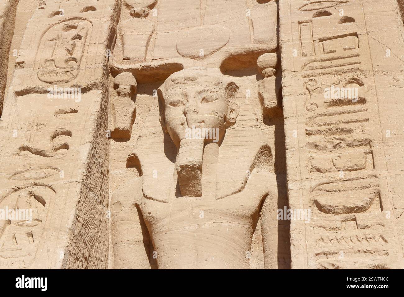 Colossal standing statues of Ramses II at entrance of the Temple of ...