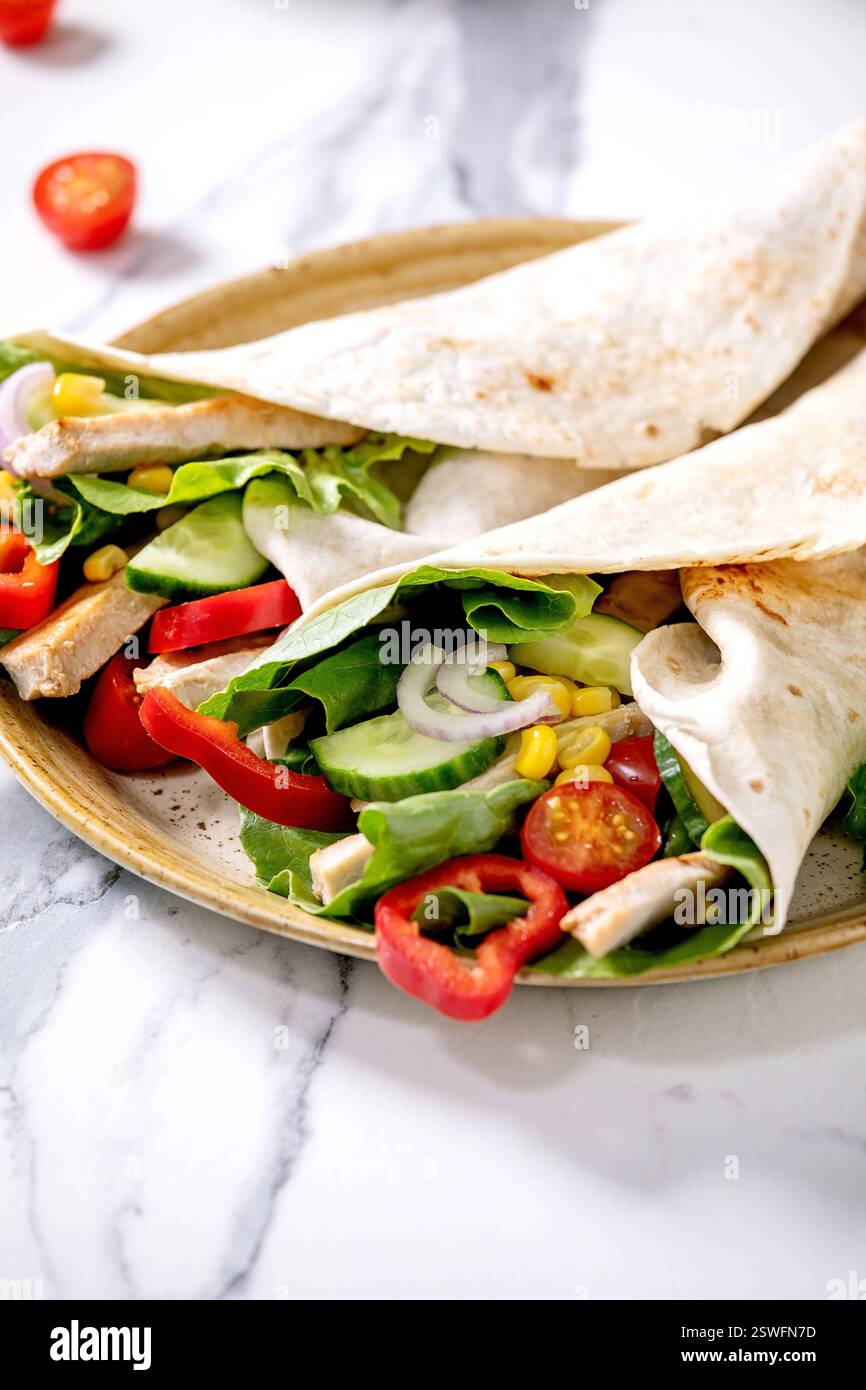 Traditional mexican tortila wrap with pork meat Stock Photo - Alamy