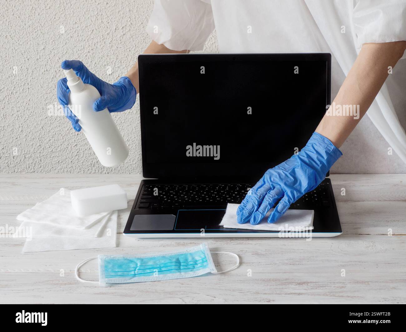 Laptop disinfection to protect yourself from bacteria and viruse Stock ...