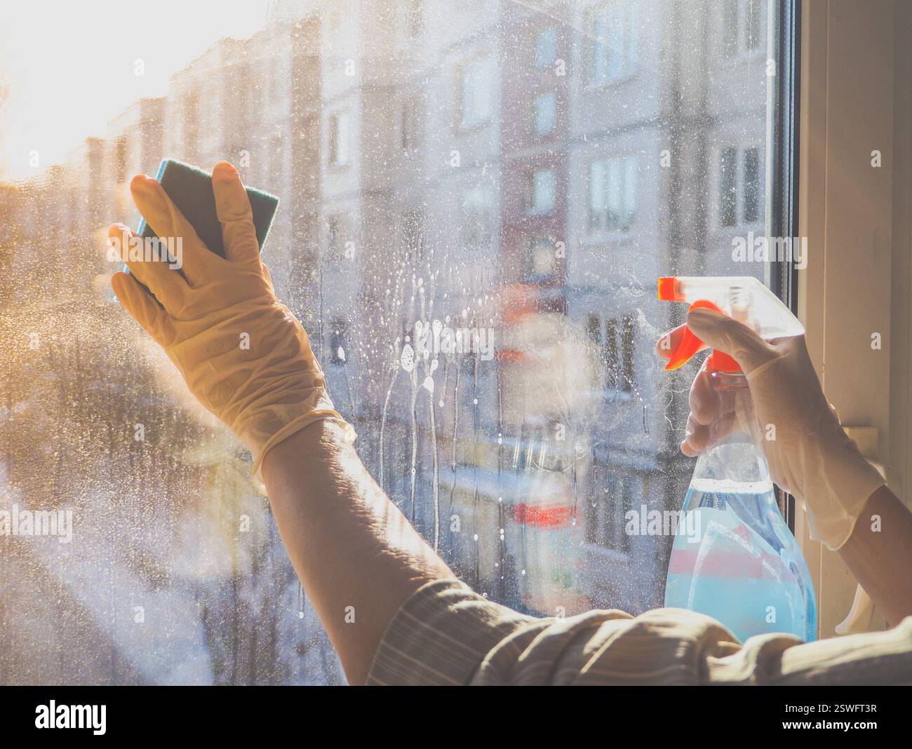 House cleaning. Washing dirty window glass detergent in winter Stock ...