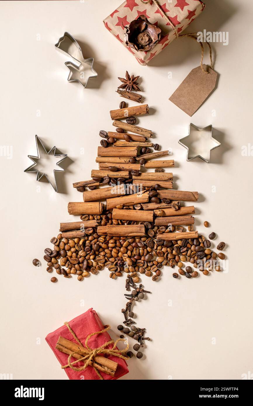 Aromatic spices collection and different coffee beans as Christmas tree ...