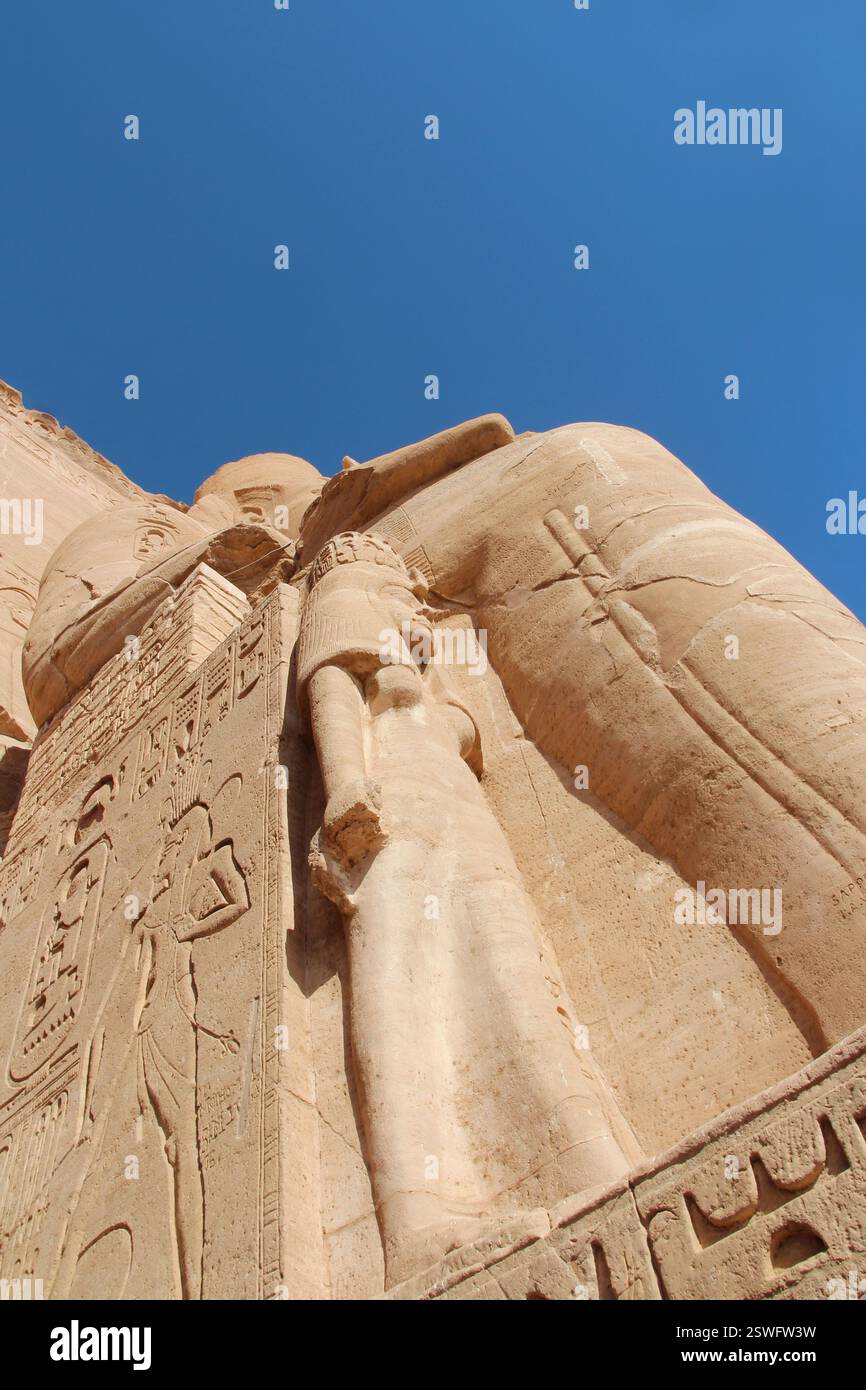 Nefertari beside a colossus of Ramses II at entrance of the Great ...