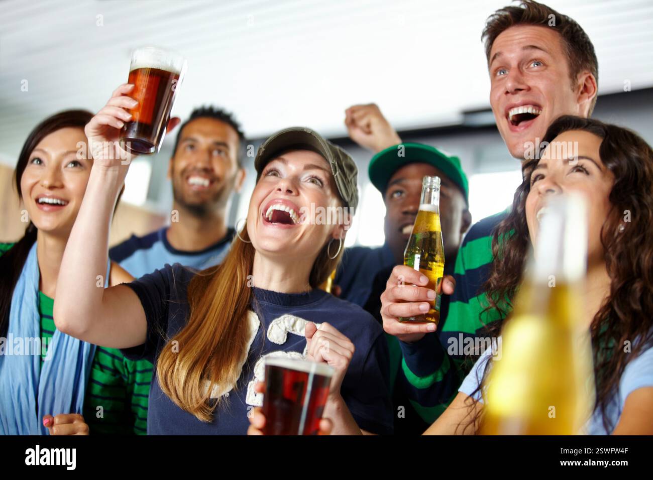 Bar, friends and football match celebration for sports goal, team pride ...