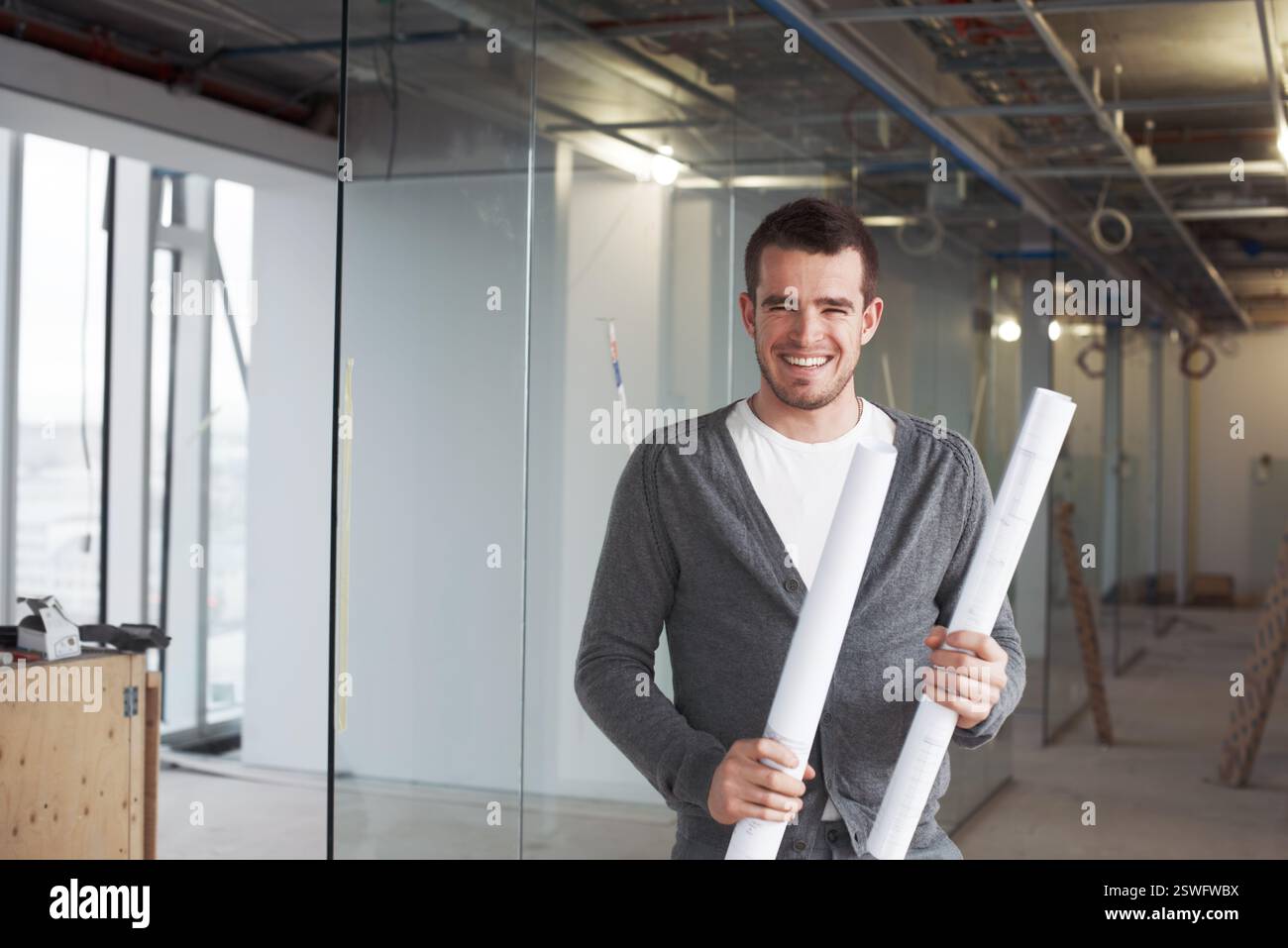 Man, blueprint and portrait with floor plan, construction site and design for urban ...