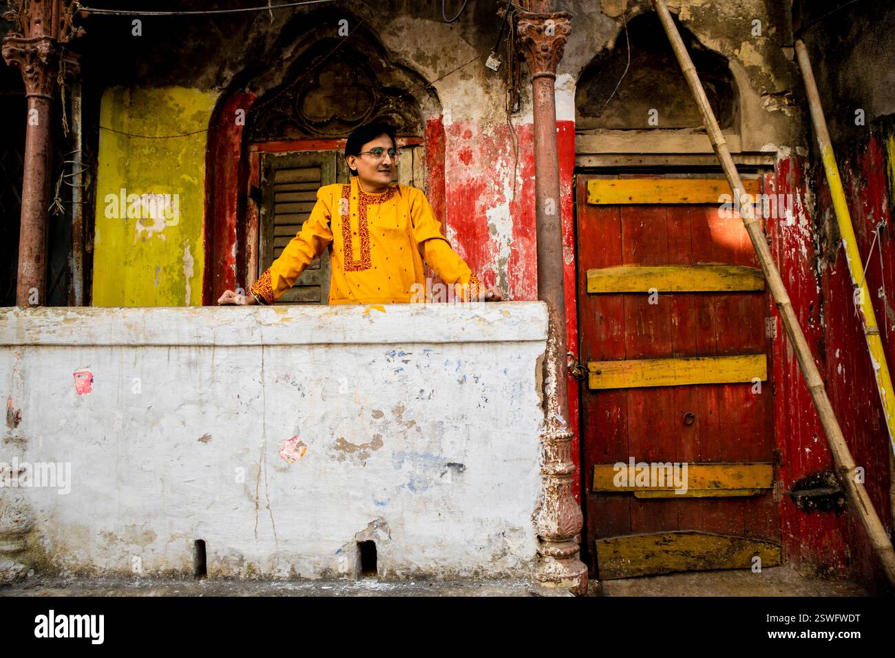 An indian man wearing an indian traditional bengali red dhoti and ...