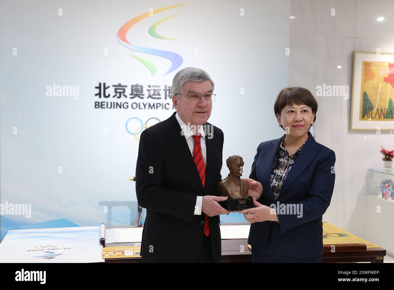 Beijing,China.20th February 2025. IOC President Thomas Bach (L ...