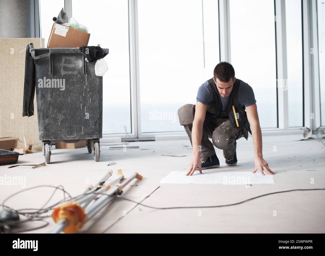 Man, floor plan and architect with construction site, planning and ...