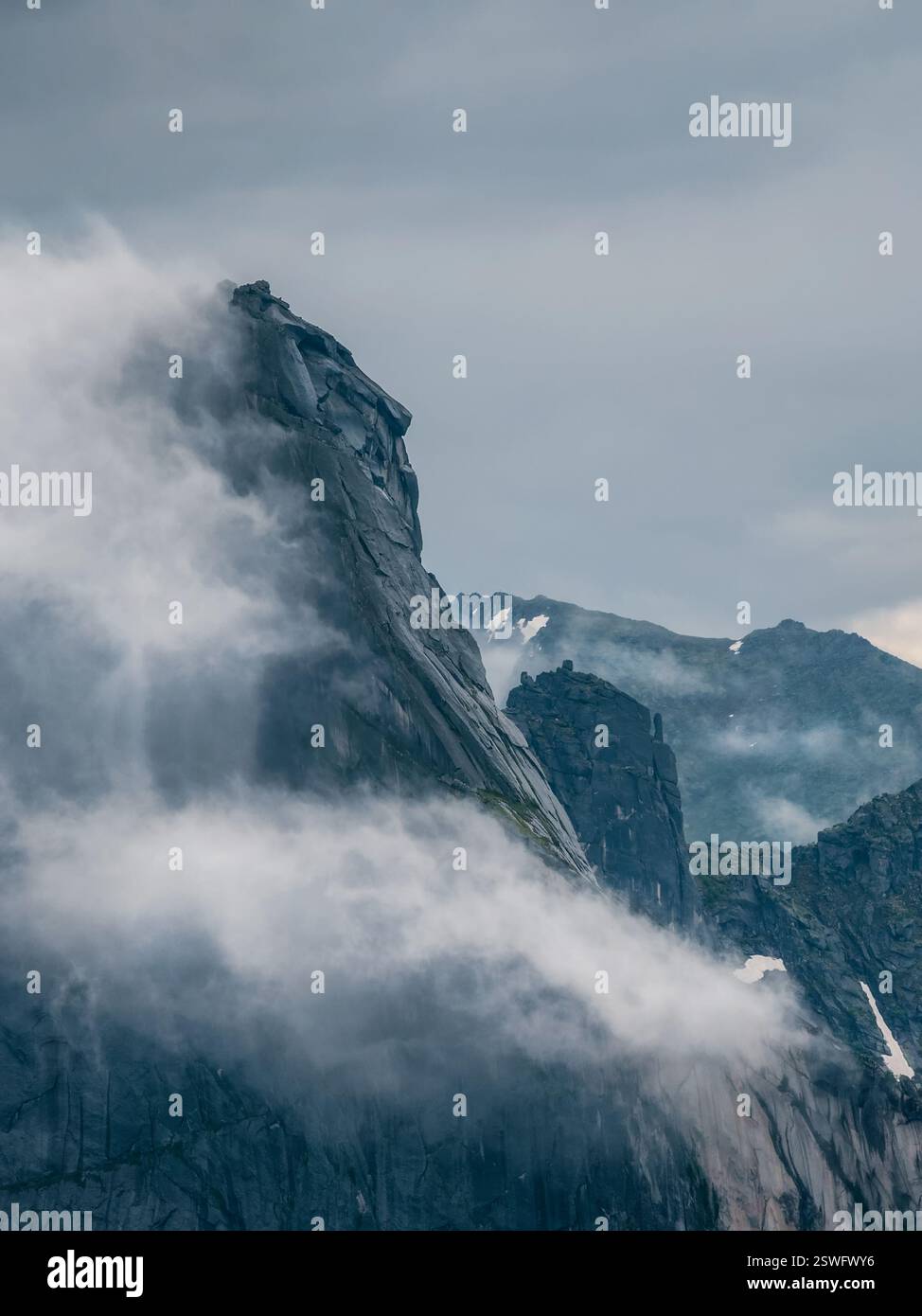 Vertical view of Mountain Face. Spirits of the mountains. Natural scary ...