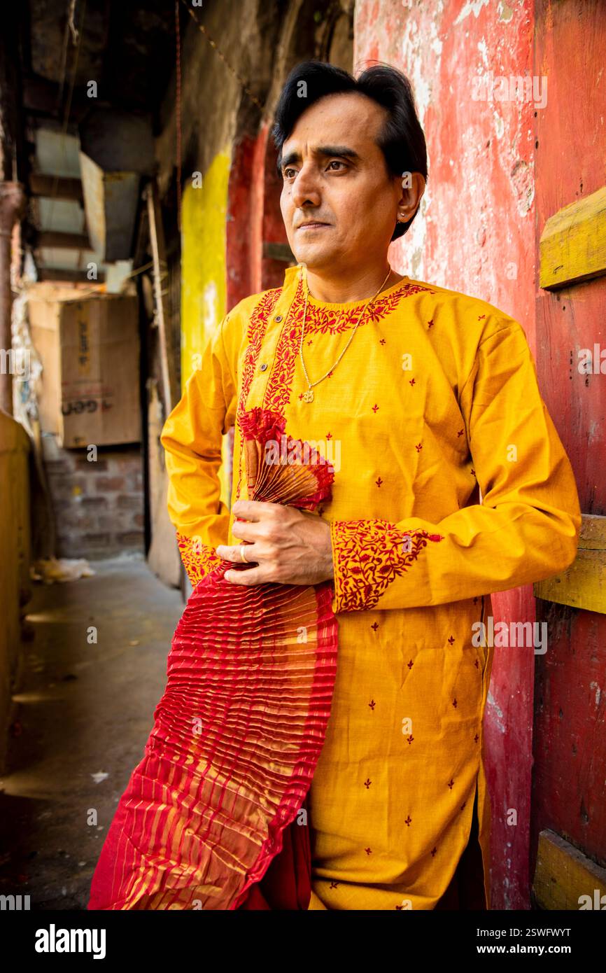 An indian man wearing an indian traditional bengali red dhoti and ...