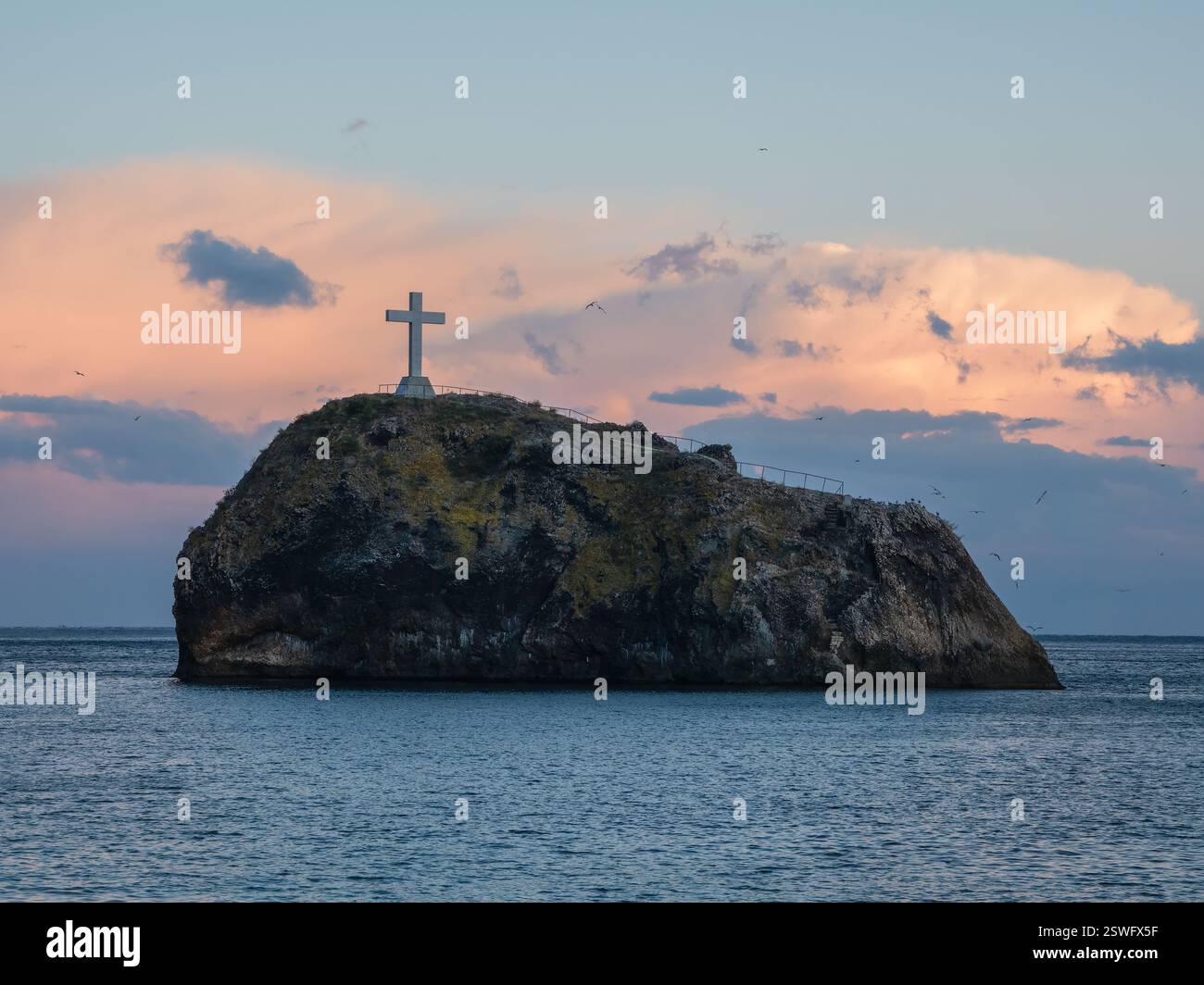 Christian cross rises on a cape fiolent hi-res stock photography and ...