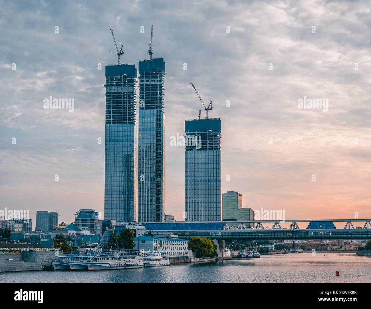 Construction work site and high rise building. High-rise building under ...