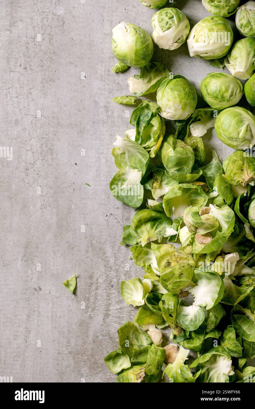 Heap of peeled raw organic brussels sprouts mini cabbage cabbage peel ...