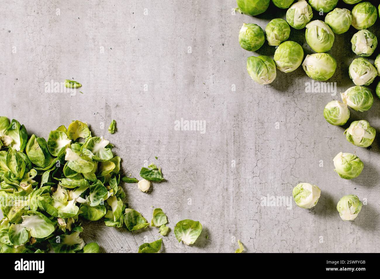 Heap of peeled raw organic brussels sprouts mini cabbage cabbage peel ...