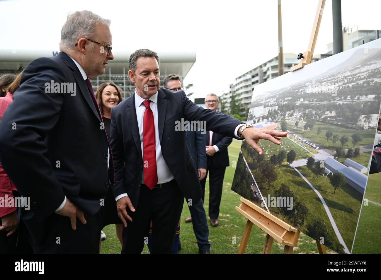 Prime Minster Anthony Albanese (left) is shown an artists impression of ...