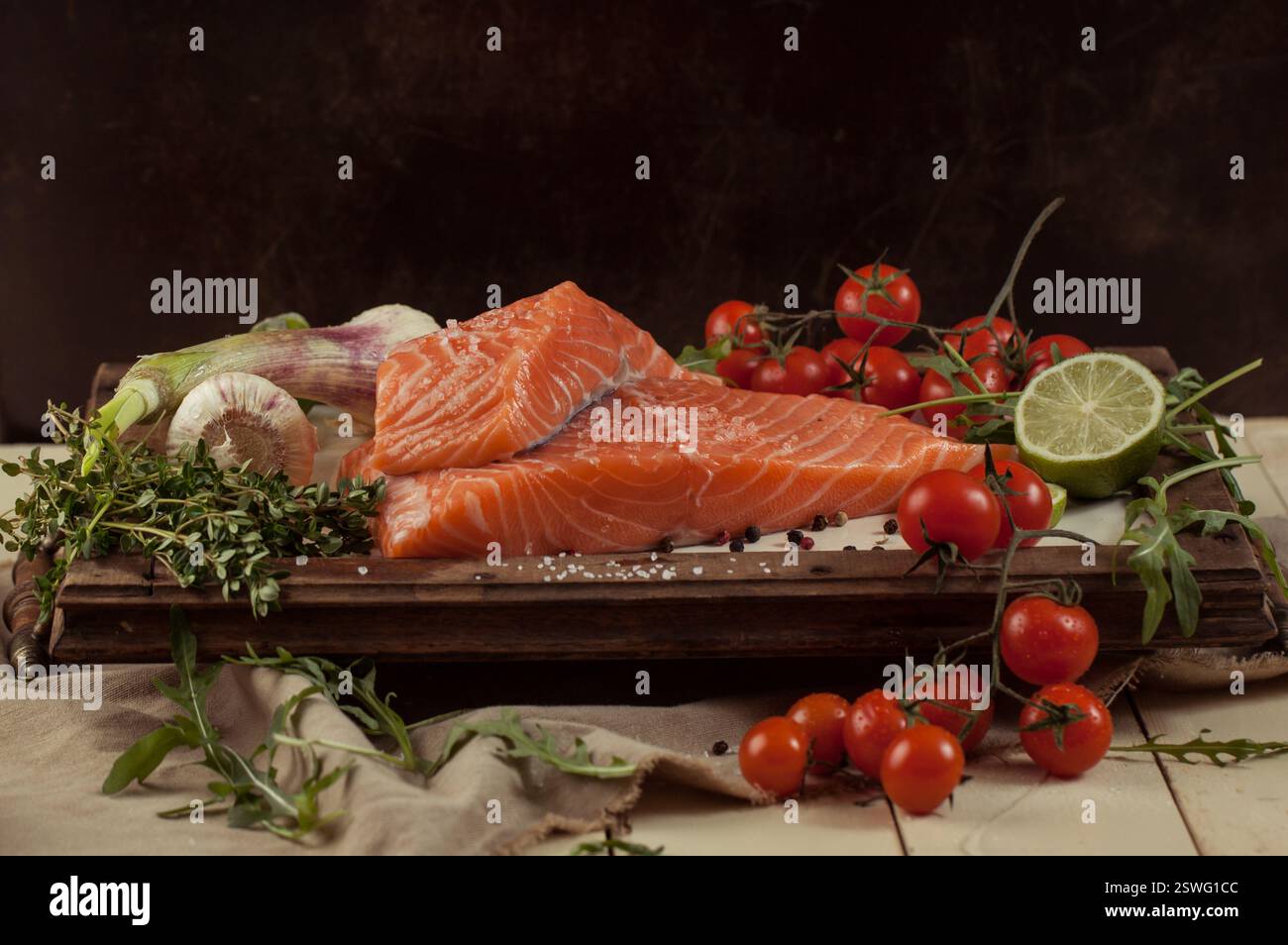 Salted fresh salmon fish on vintage board with vegetables spice hi-res ...
