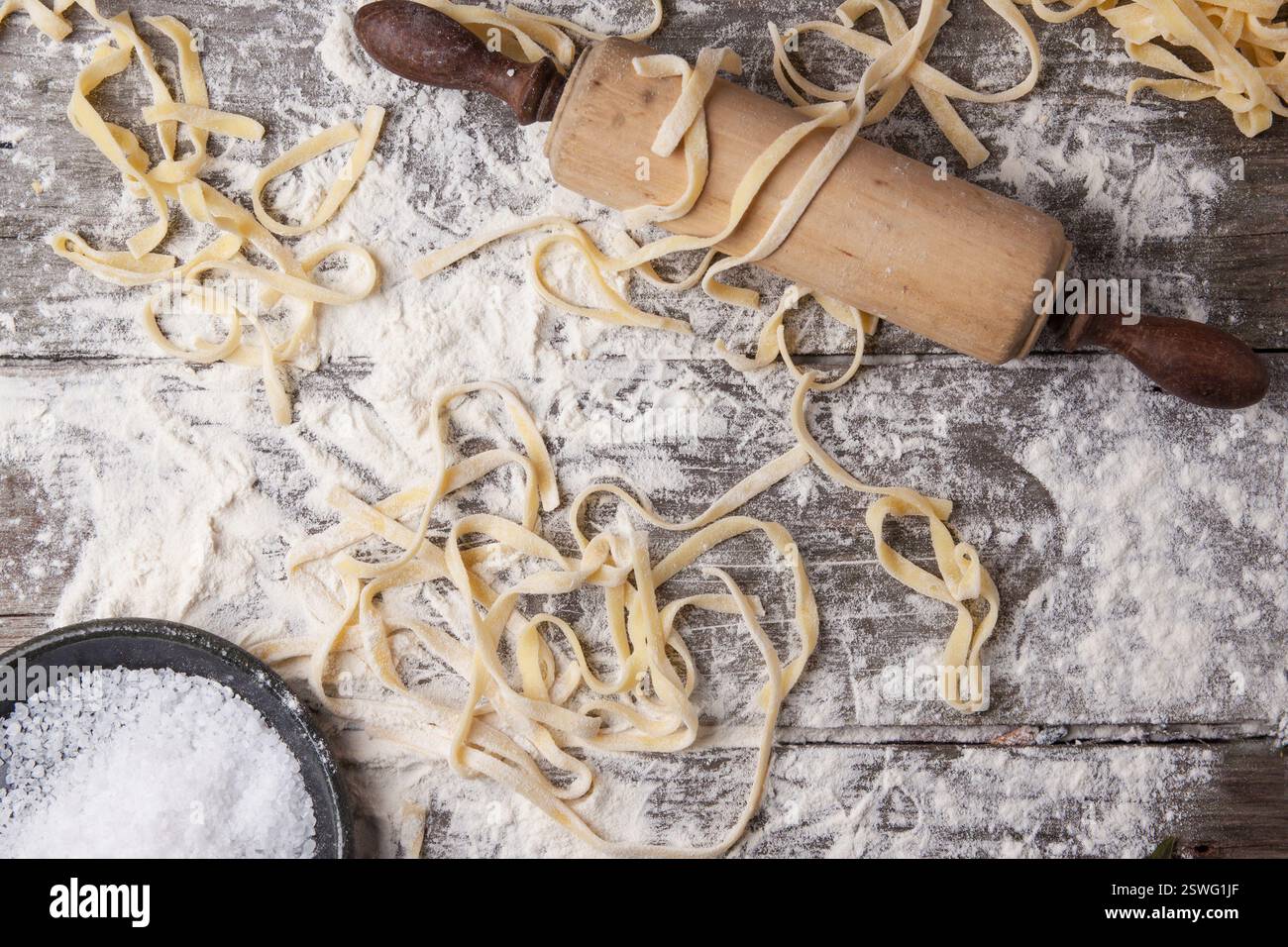 Raw homemade pasta rolling hi-res stock photography and images - Alamy