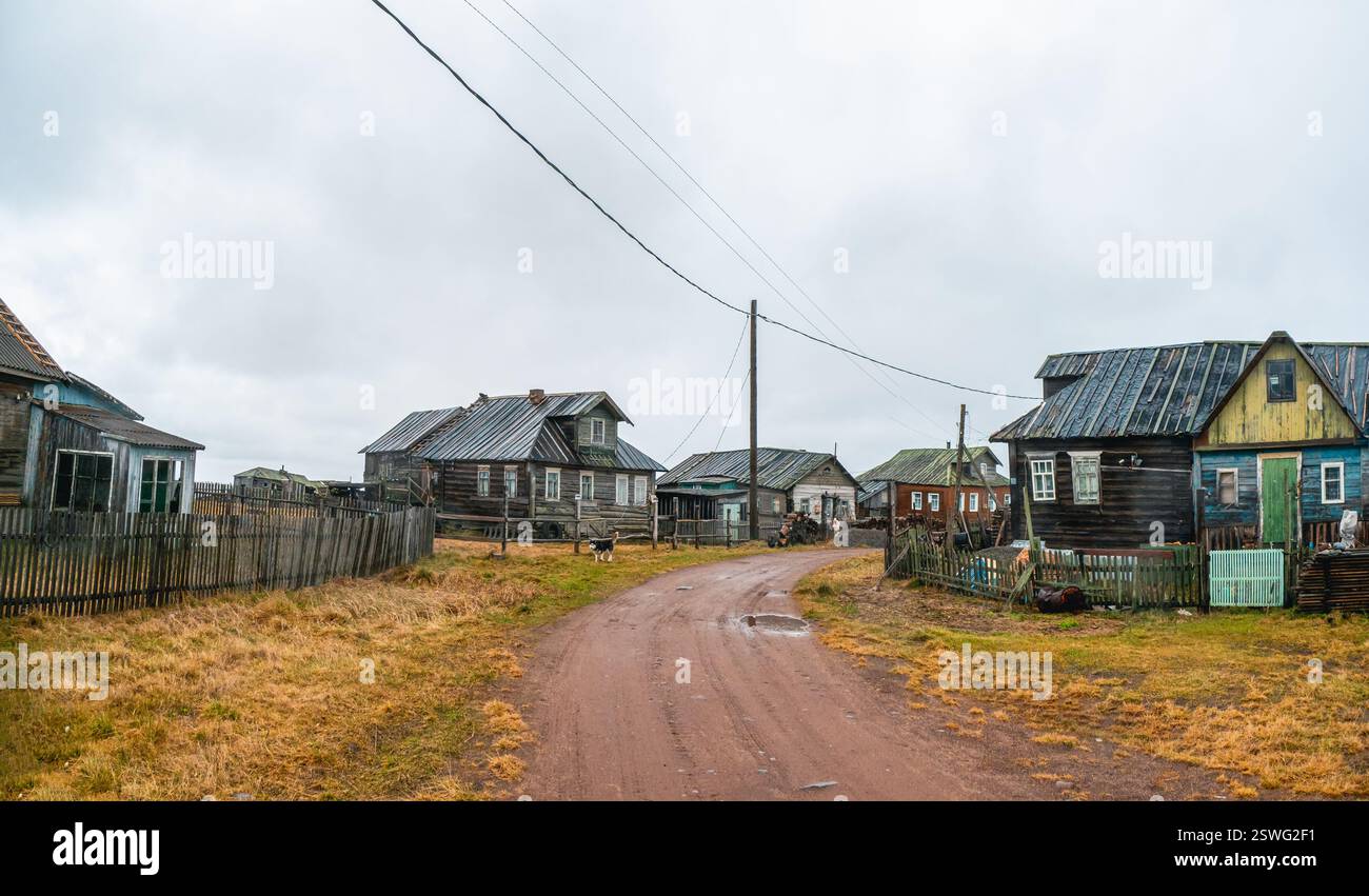Rural dirt road. A small authentic village on the White sea coast ...