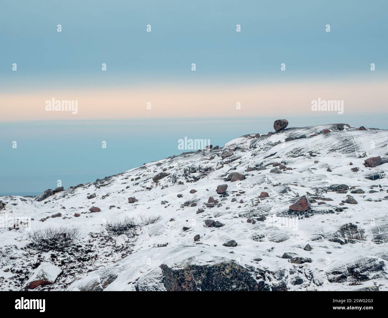 Balancing Rock on the Arctic hills in the background of the polar sky ...
