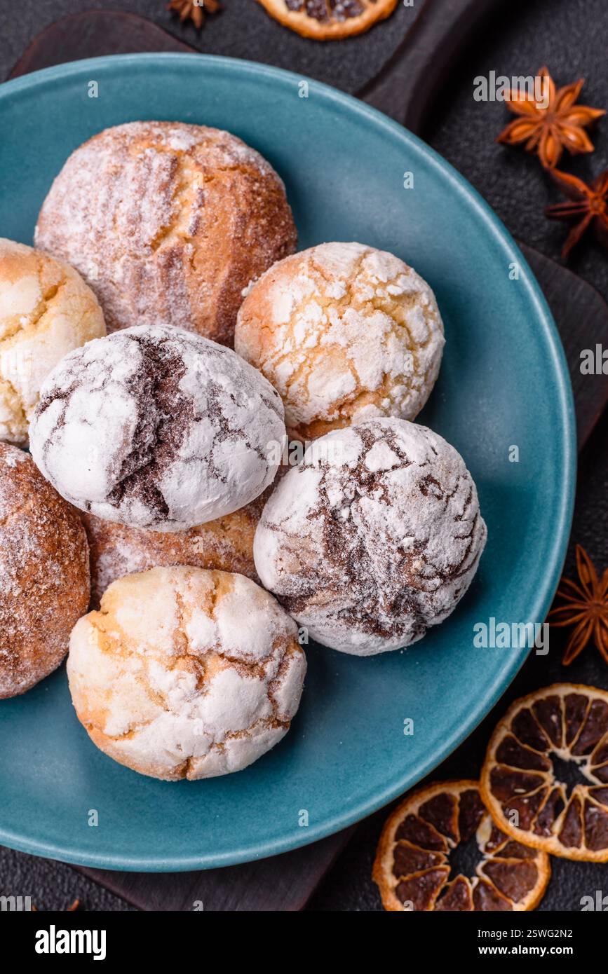 Sweet freshly baked round cookies of several types with lemon ...