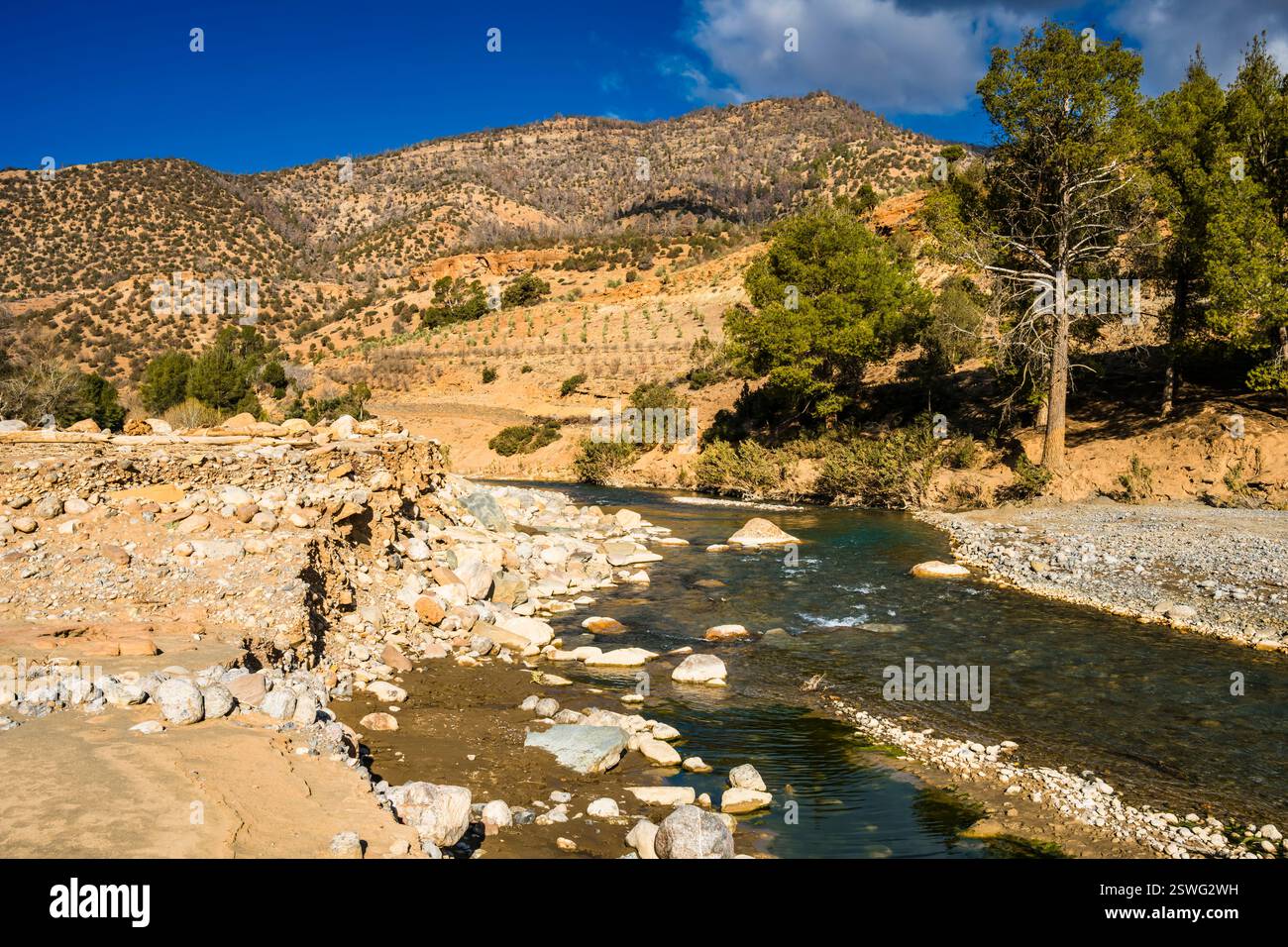 The river Assif Ahansal below Imsfrane Cathedral, High Atlas Mountains ...