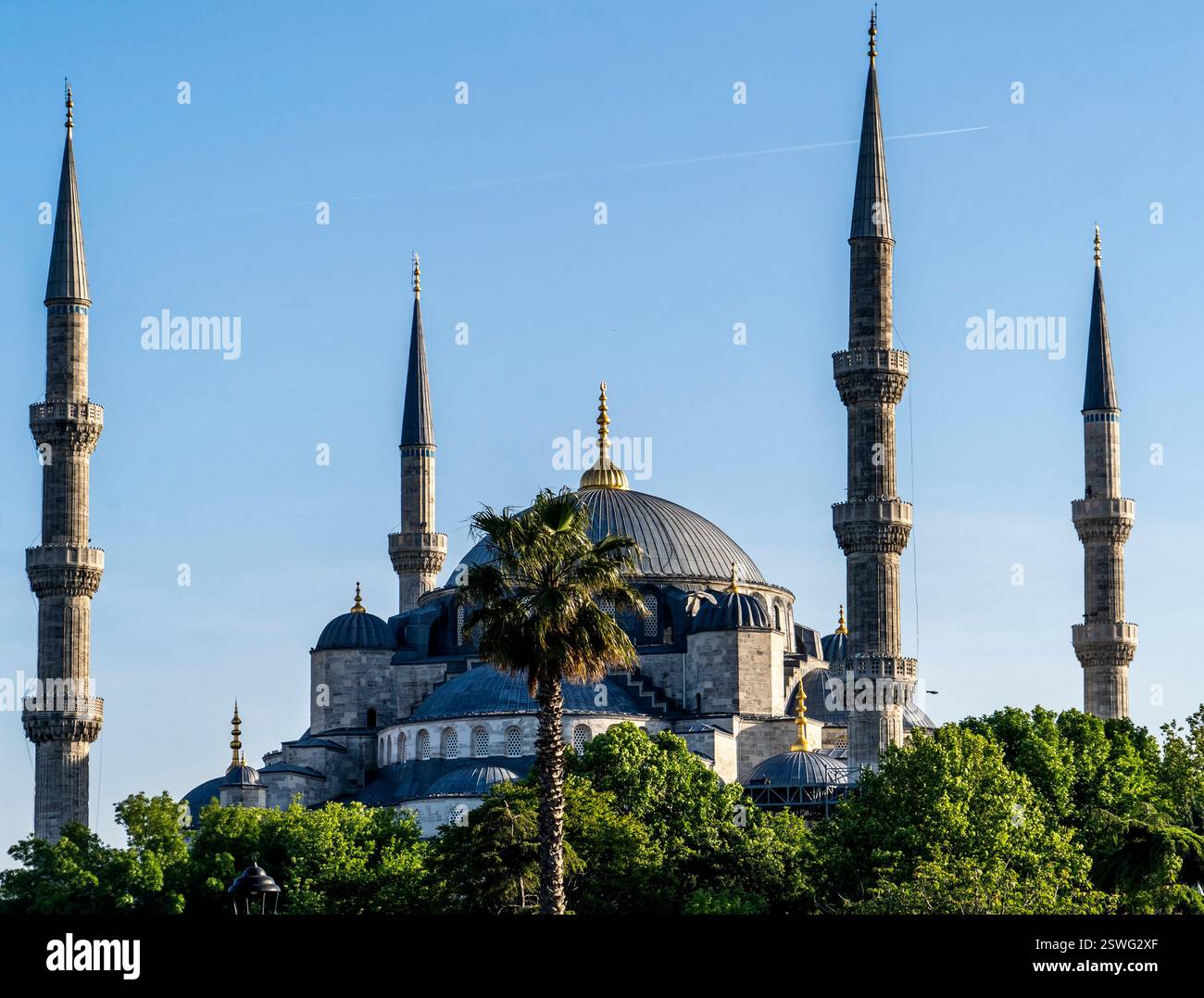 A stunning view of a historic mosque with multiple tall minarets ...