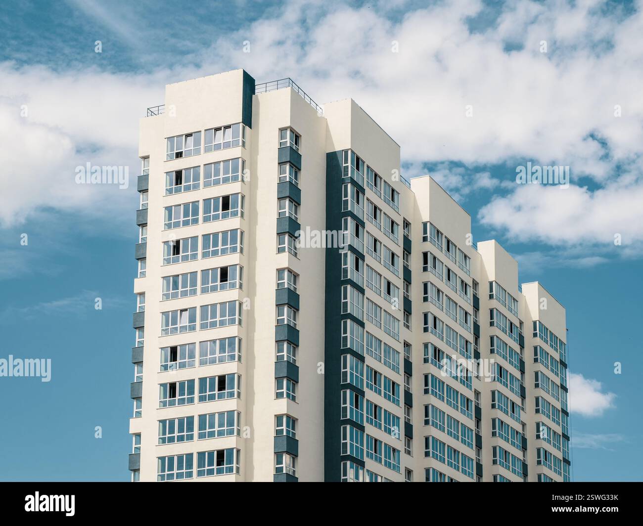 Modern beautiful new high-rise residential building. Colored wall on ...