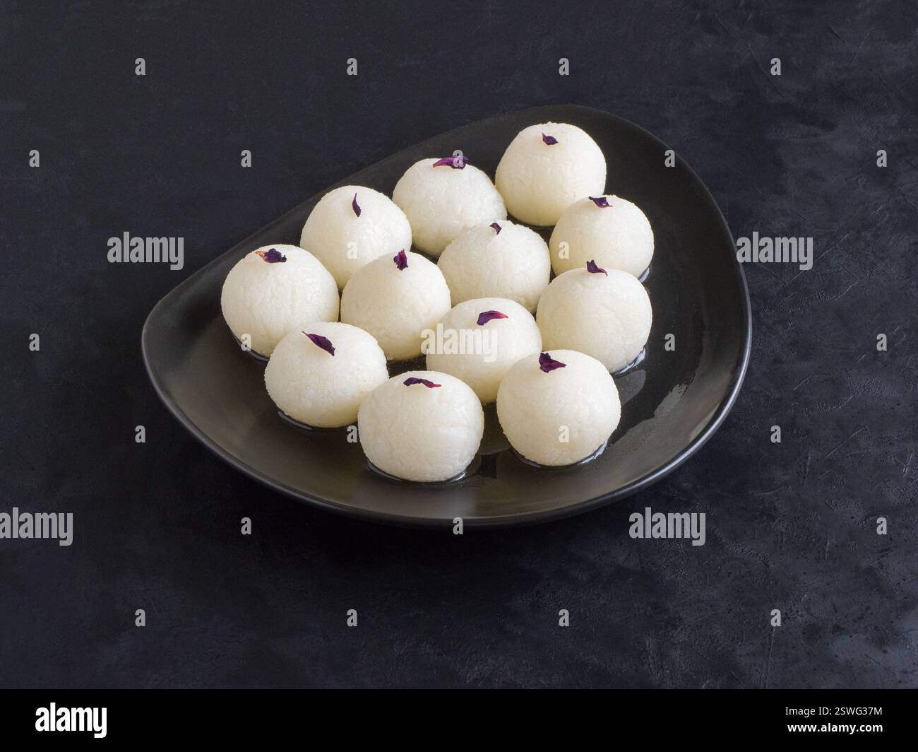 Sponge Rasgulla sweets, famous indian sweet food. Top view Stock Photo ...