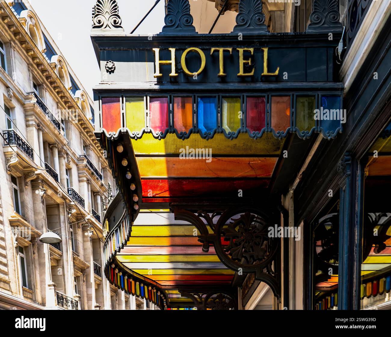 A colorful hotel awning with the word 'HOTEL' prominently displayed ...