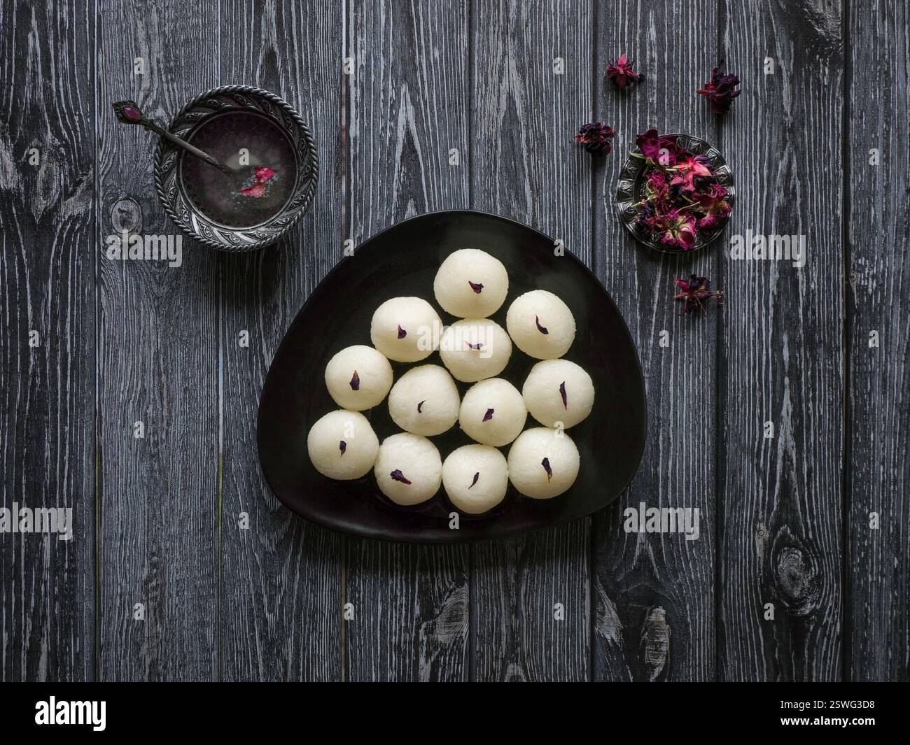 Sponge Rasgulla sweets, famous indian sweet food. Top view, copy space ...