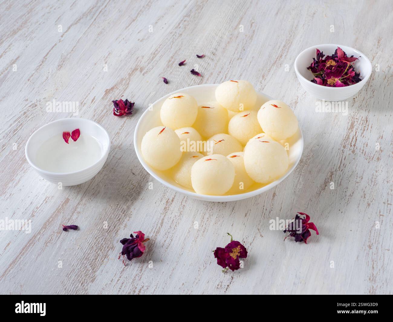 Indian Rasgulla dessert. Sweet served in a bowl, top view Stock Photo ...