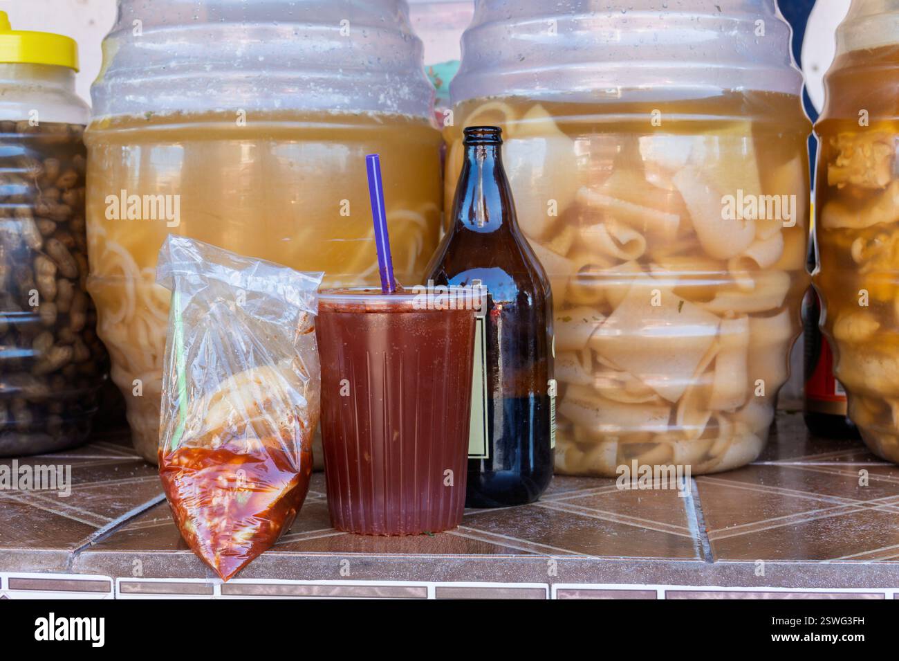 Authentic Mexican street food featuring pig trotters in spicy sauce and ...