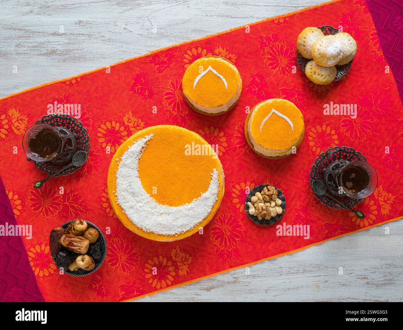 Homemade golden cake with a Crescent moon, served with tea cup and ...