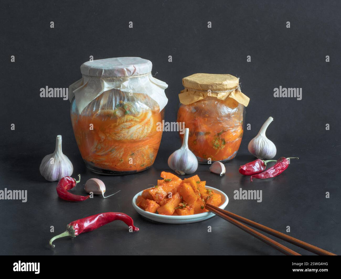 Korea kimchi pumpkin pickles on a black background Stock Photo - Alamy