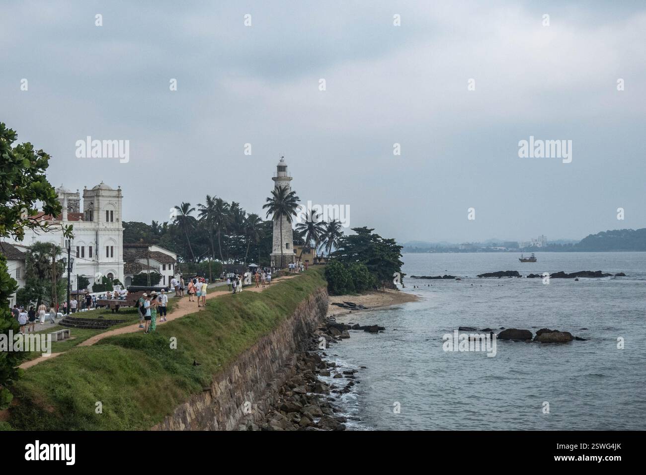 View of the historical Galle Lighthouse and Galle Fort Mosque, Galle ...