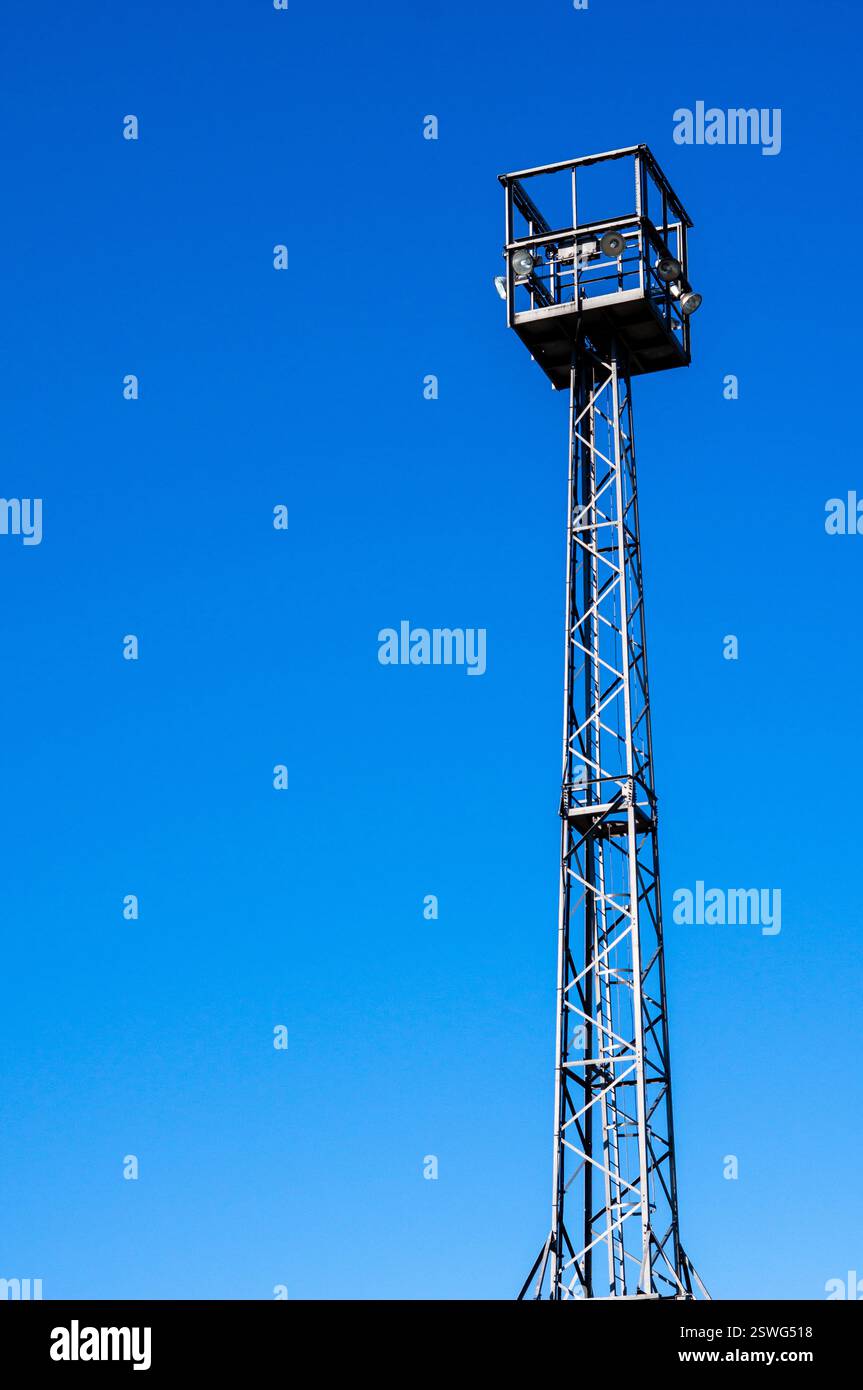 metal tower with lights industry object in the blue sky vertical Stock ...