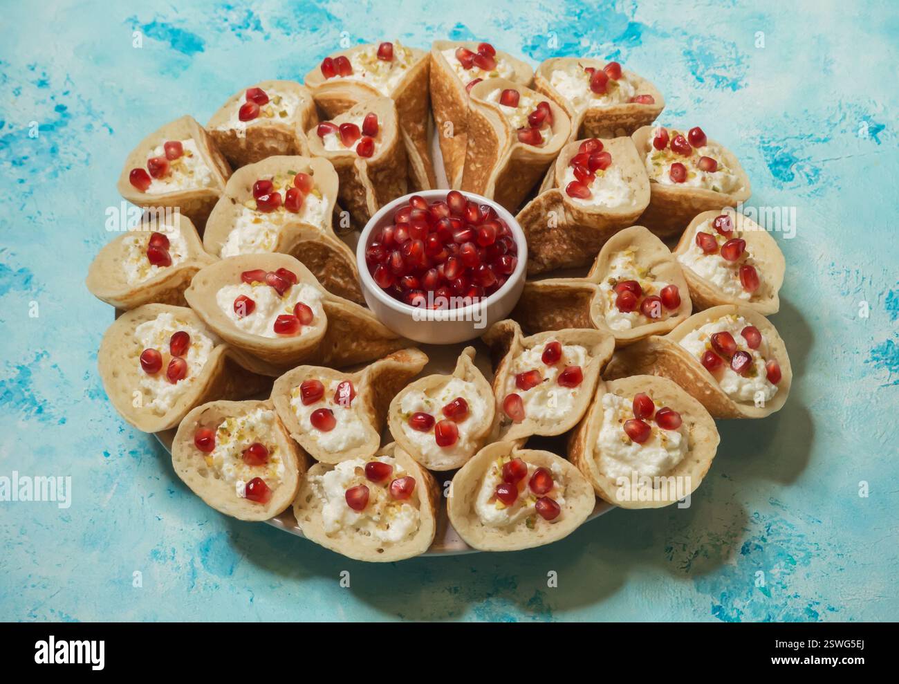 Arabic sweet pancakes with filling. Top view Stock Photo - Alamy