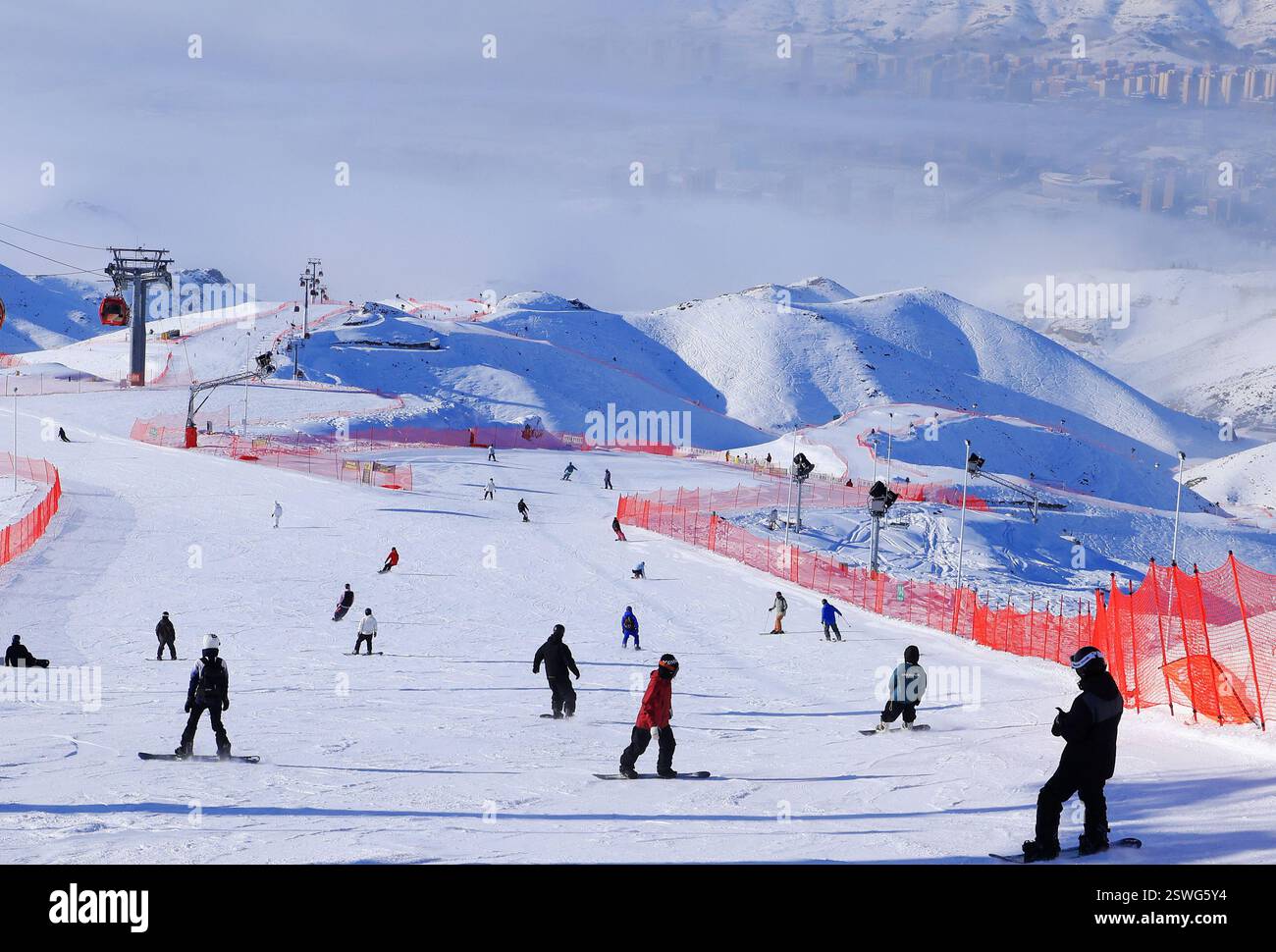 ALTAY, CHINA - FEBRUARY 21, 2025 - Snow lovers ski at the International ...